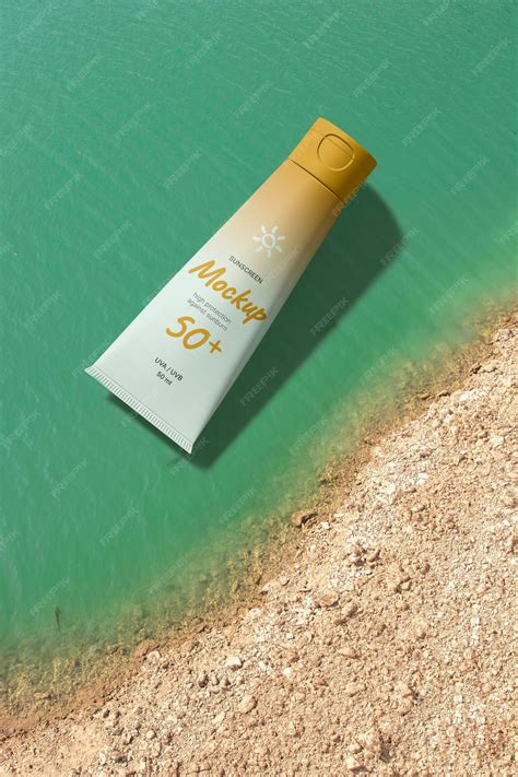 Premium Psd Sunscreen Container On The Beach