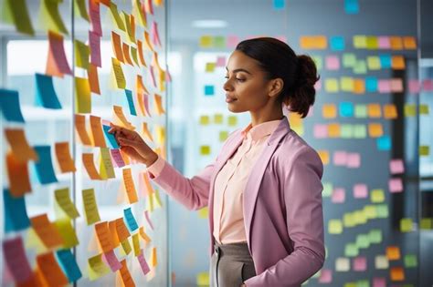 Premium AI Image Joyful Businesswomen Crafting A ToDo List With