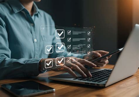 Efficient Task Management A Person Utilizing Technology For Productivity And Checklist