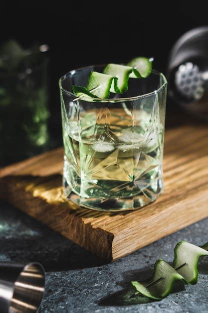 Premium Photo Alcohol Cocktail With Cucumber In Whiskey Glass With