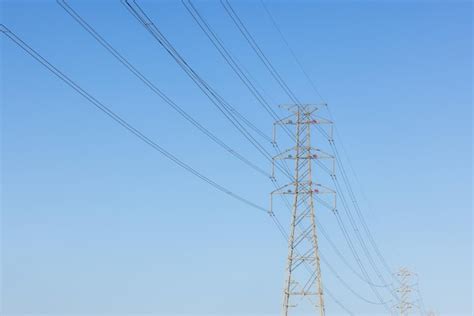 Premium Photo Pylon And High Voltage Powerline Over The Blue Sky