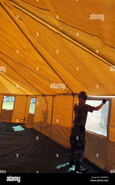 Us Navy Construction Electrician Assigned Naval Mobile Construction Battalion Four Zero Nmcb 40