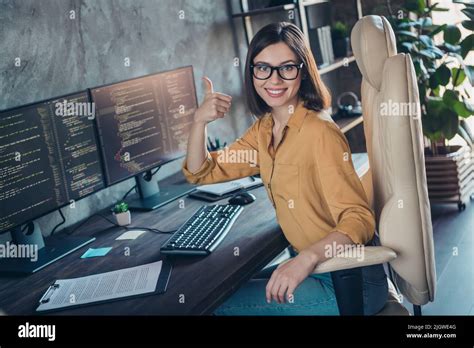 Portrait Of Attractive Cheerful Girl Editing Database Developing Web