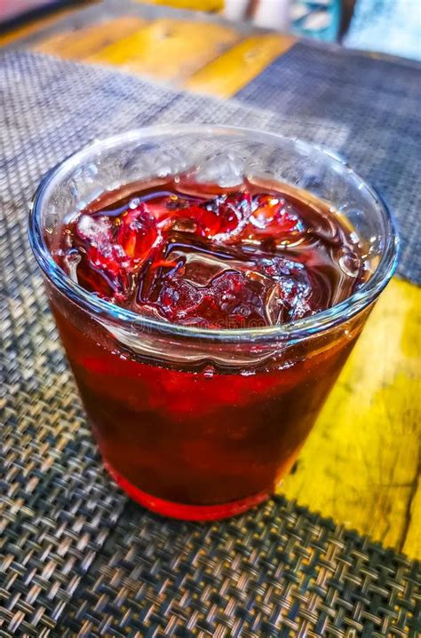 Glass Of Jamaican Iced Tea Juice On The Table Mexico Stock Image Image Of Tasty Straw 302684553