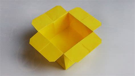 Оригамі коробочка з чотирма ручками Як зробити орігамі коробочку з паперу Оригами