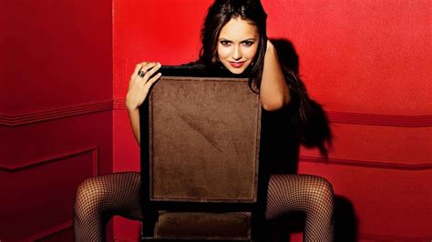 Download Legs Spread In A Red Room Wallpaper