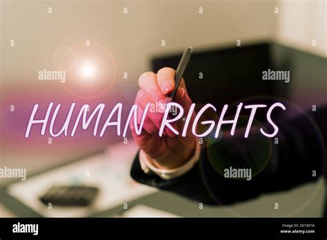Hand Writing Sign Human Rights Word For Moral Principles Standards