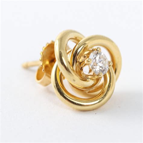 Pair Of Tiffany And Co 18 Karat Yellow Gold Love Knot Diamond Earrings