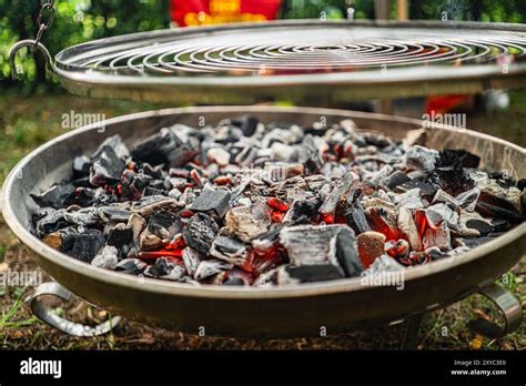 Grill Fireplace With Burning Red Coal In A Metal Bowl Ready To Grill