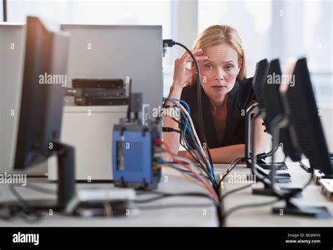 Woman With Networked Computers Stock Photo Alamy