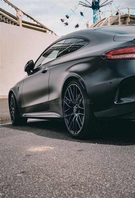 Vertical Shot Of A Matte Black Mercedes Amg C Class Coupe Editorial Photography Image Of