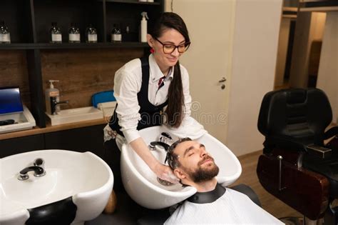 Cute Female Barber Washes And Massages The Head Of A Man Stock Image Image Of Shampoo Stylist