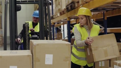 Woman Warehouse Worker Loading Boxes Stock Footage VideoHive