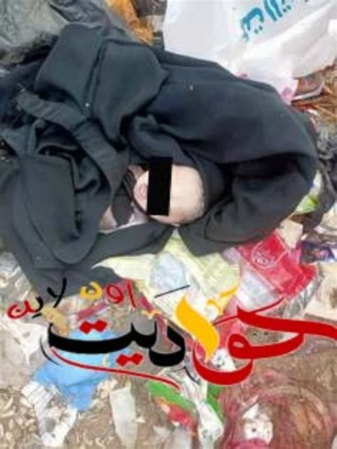 العثور علي جثة رضيع حديث الولادة مخنوق وأحشائه خارج البطن وسط القمامة