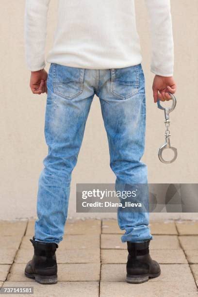Handcuffed Behind Her Back Photos And Premium High Res Pictures Getty