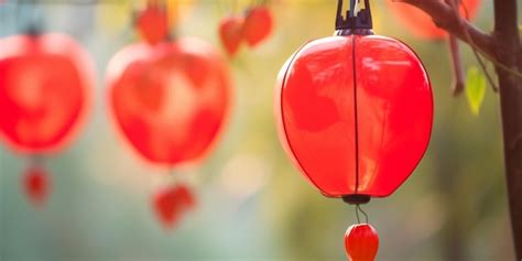 Premium AI Image Red Lanterns Hanging From A Tree
