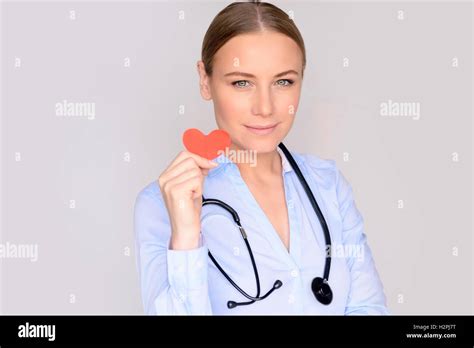 Portrait Of A Beautiful Serious Doctor Wearing Medical Uniform And
