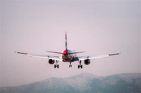 Premium Photo Rear Of A Plane About To Land At An Airport