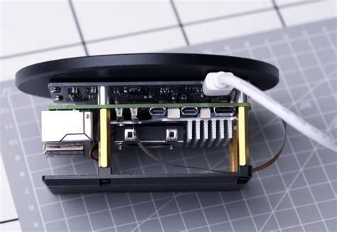 This Raspberry Pi Transparent Display Is Made Using A Glass Dome