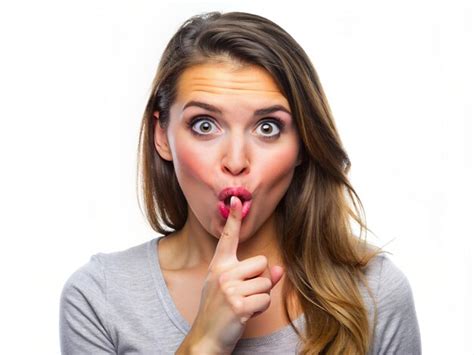 A Young Women Making A Skeptical Expression With Her Tongue Out And