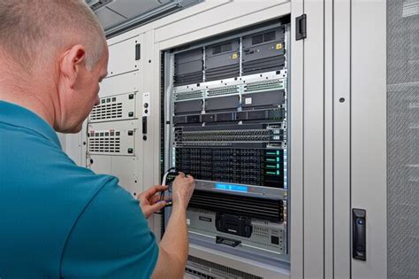 Premium Photo It Team Deploying A Server Backup Solution For Data Protection