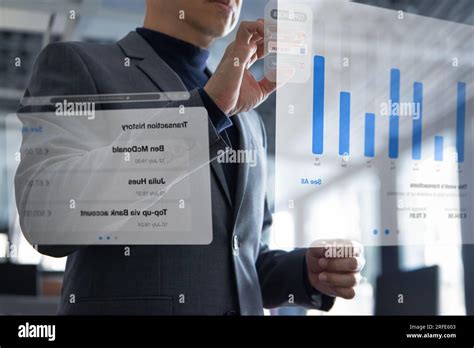 Businessman In The Office Interacting To Augmented Reality Or Virtual Touch Screen To Enter