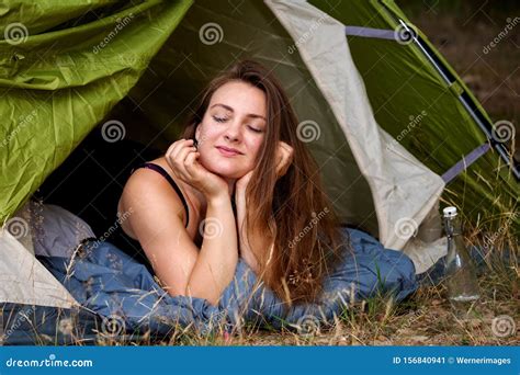 Young Brunette Woman Lying In Tent With Her Eyes Closed Stock Image Image Of Alone Outdoors