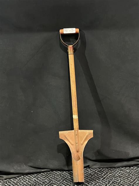 A Gardener Planter Tool Beck Auctions Inc