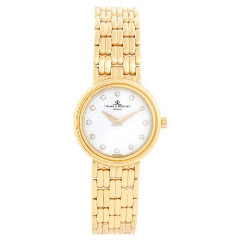 18 Karat Gold Baume And Mercier Loop Shape Diamond Ladies Watch With