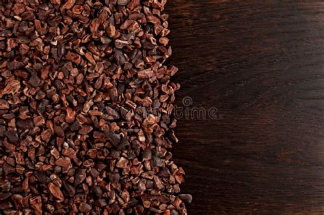 Cocoa Nibs On Brown Wooden Surface Close Up Design Element Copy