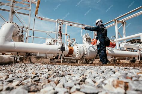 Premium Photo Production Operator Opening Ball Valve At Pipeline Oil
