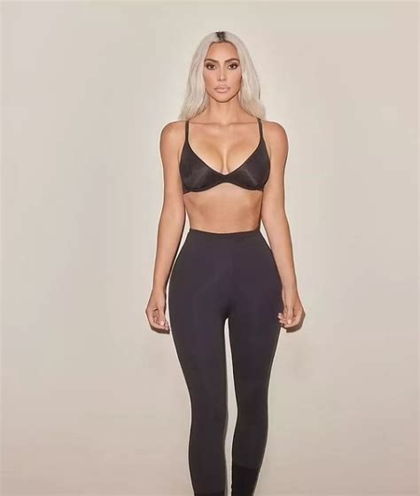 Kim Kardashian Forced To Cover Up As She Dons Sheer Black Bras In Racy