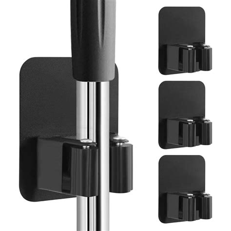 พร้อมสต็อกที่วางไม้กวาดไม้ถูพื้นติดผนังกาวตนเองไม่มีการเจาะไม้กวาดและที่แขวนที่ตักขยะสําหรับบ้าน