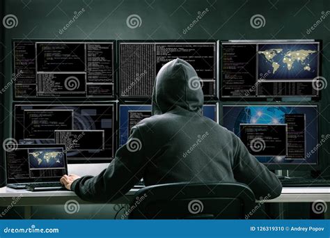 Hacker Using Multiple Computers For Stealing Data Stock Photo Image
