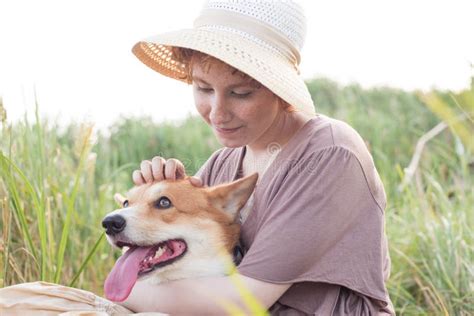 Redhead Woman With Corgi Dog In Countryside Stock Image Image Of