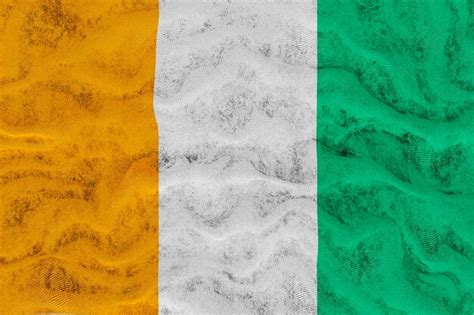 코트디부아르의 국기와 코트디부아르 배경의 국기 프리미엄 사진