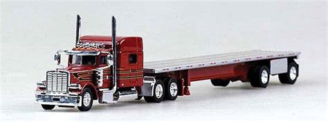 Tns Peterbilt 389 Tractor With 48 Spread Axle Flatbed Trailer