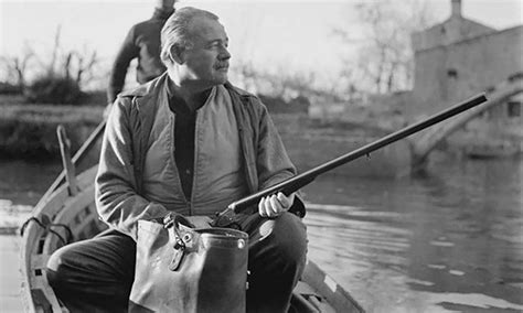 Ernest Hemingway On A Hunting Trip Near Venice In 1948 Holding What