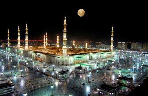 An Aerial View Of The Grand Mosque At Night With Full Moon