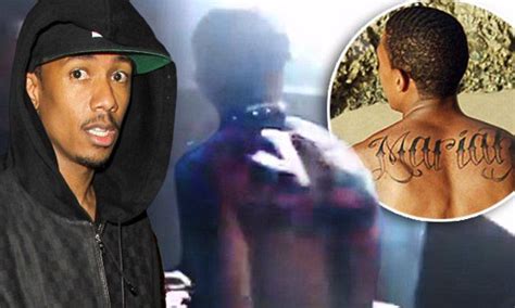 Nick Cannon Covers Up Mariah Tattoo With A Crucifix Ja Rule Back