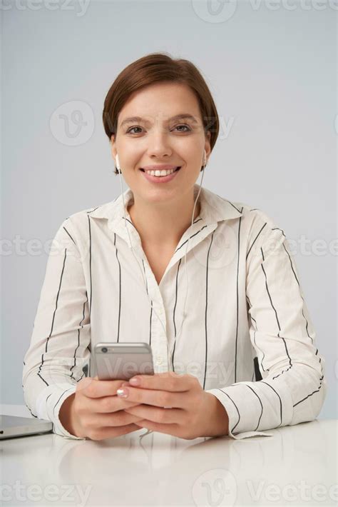 Indoor Photo Of Beautiful Young Brown Eyed Brunette Woman Looking