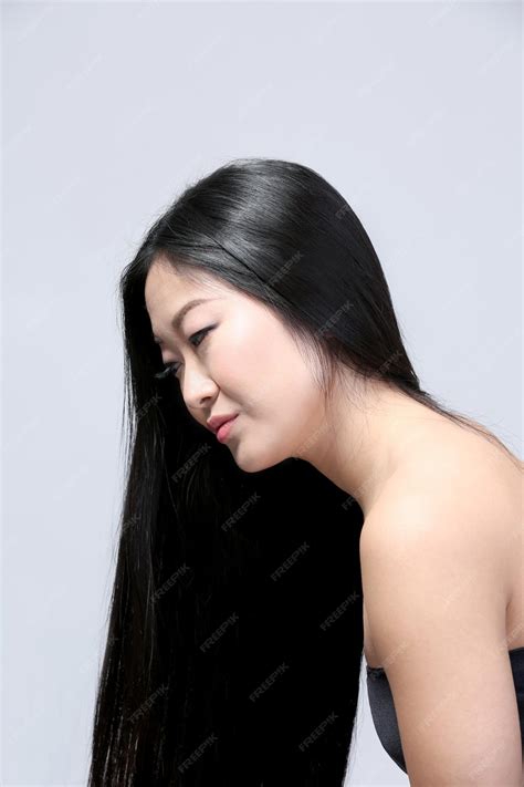 Premium Photo Beautiful Asian Woman With Long Straight Hair On Light