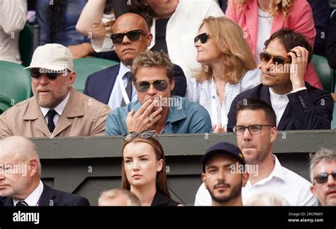 Brad Pitt Centre And Guy Ritchie Left Watching The Gentlemens Singles Final On Day Fourteen
