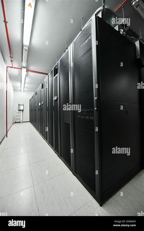 A Professional Data Center Features Rows Of Server Hardware In A Sleek