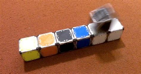 Self Propelled Robotic Cubes Can Form Into Structures