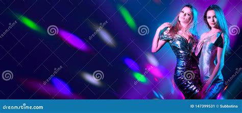 Hot Model Girls Dancing In Uv Neon Lights Disco Party Stock Image