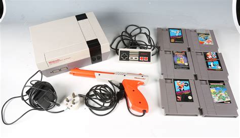 A Nintendo Entertainment System Nes Version Together With Gun Single