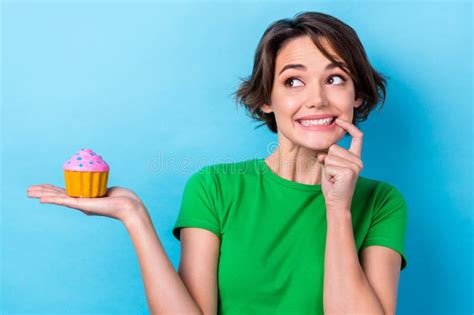 Photo Of Cute Woman Bite Nail Looking Want Eat More Sweets Muffin