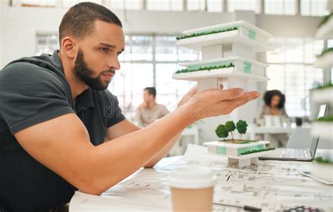 Young Architect Looking At 3d Model Professional Architect Planning A