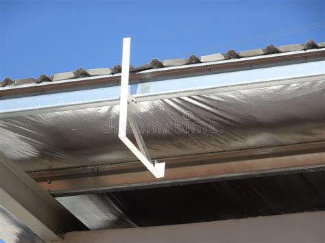 Installation Of The Aluminum Cladding Frame At The End Of The Roof Is Underway Editorial